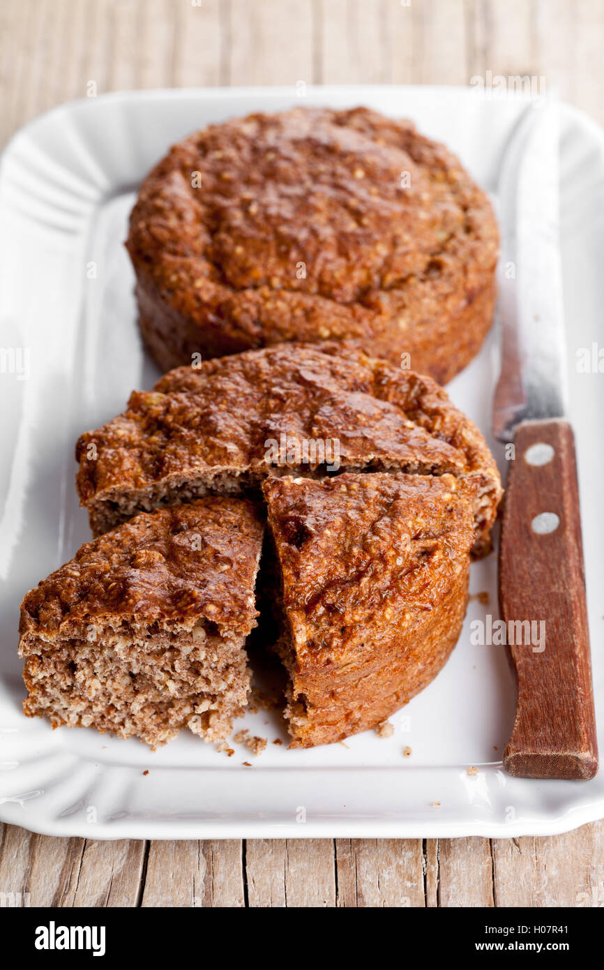 sliced fresh buns and knife Stock Photo - Alamy