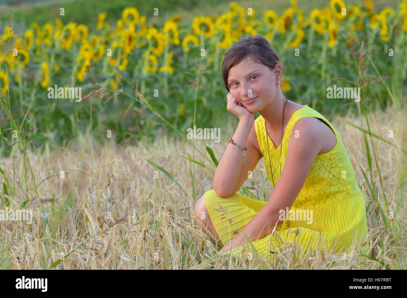 beautiful girl on field in summer Stock Photo - Alamy