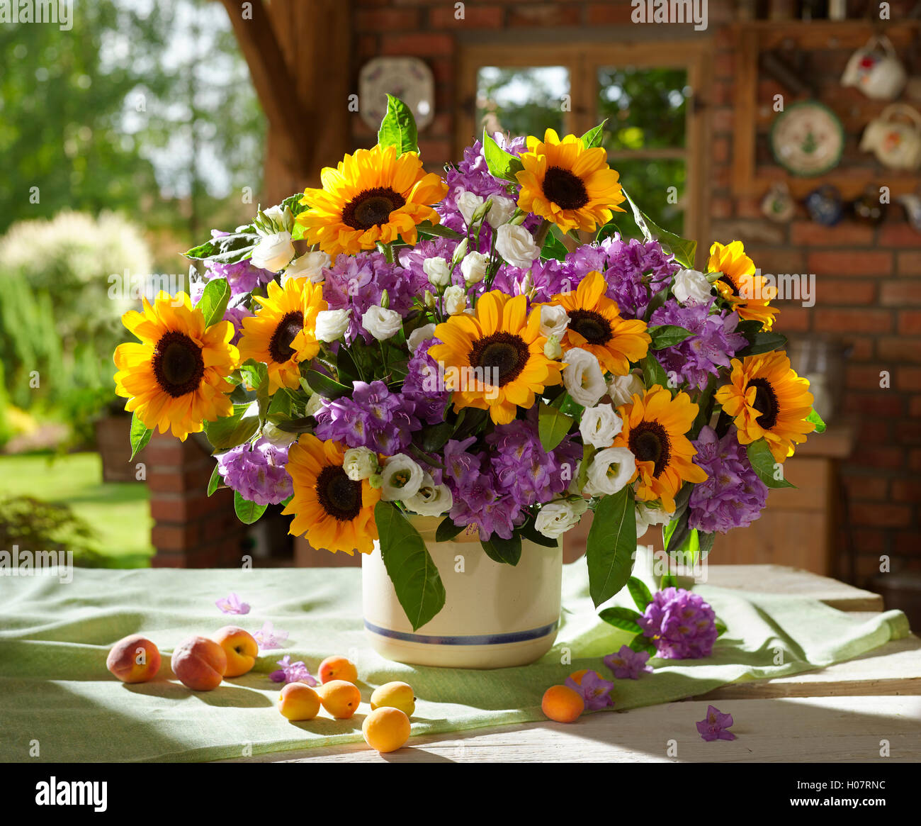 Bouquet of flowers including sunflowers, azaleas Stock Photo - Alamy
