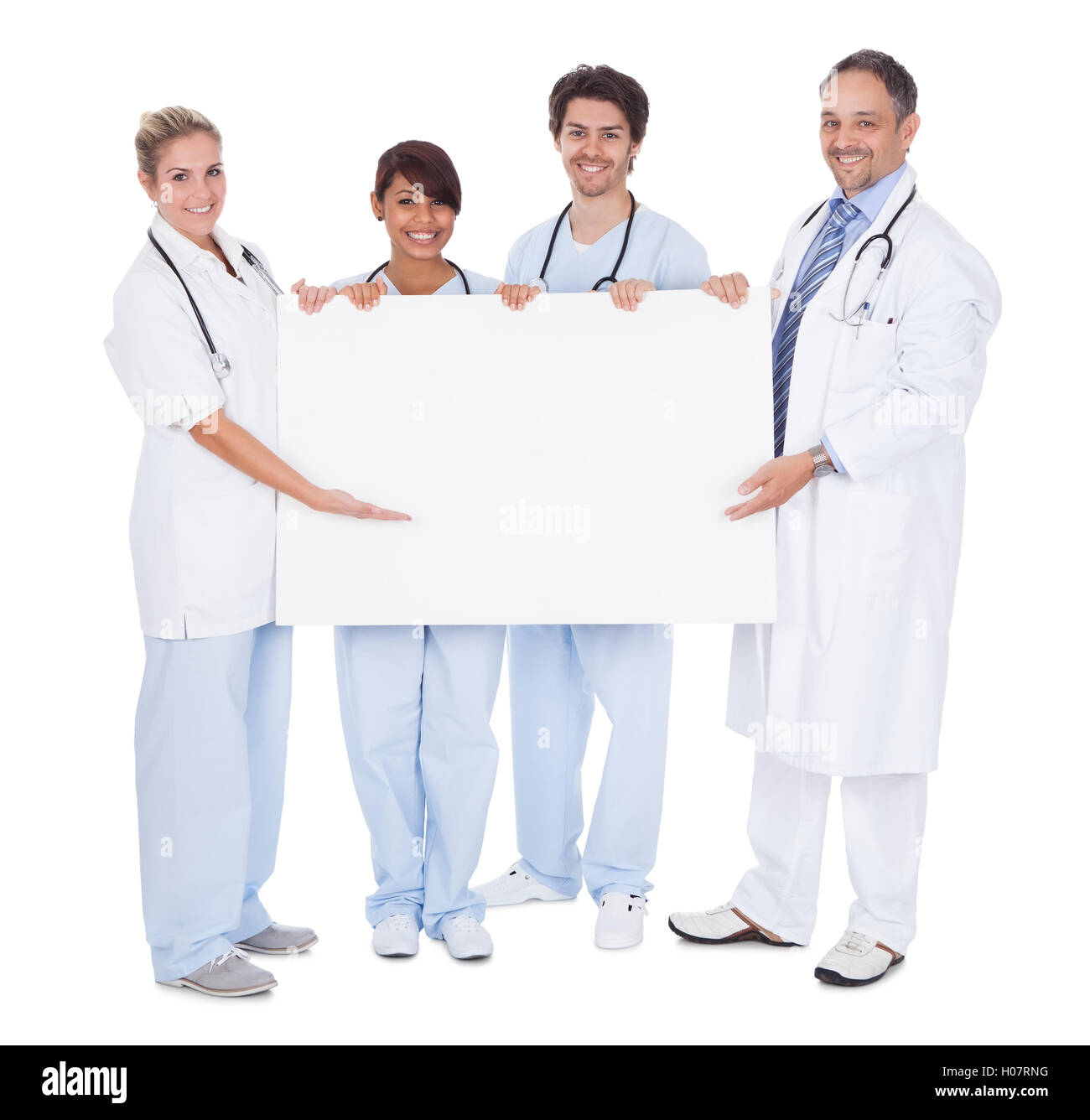Nurse showing medical sign billboard standing hi-res stock photography ...
