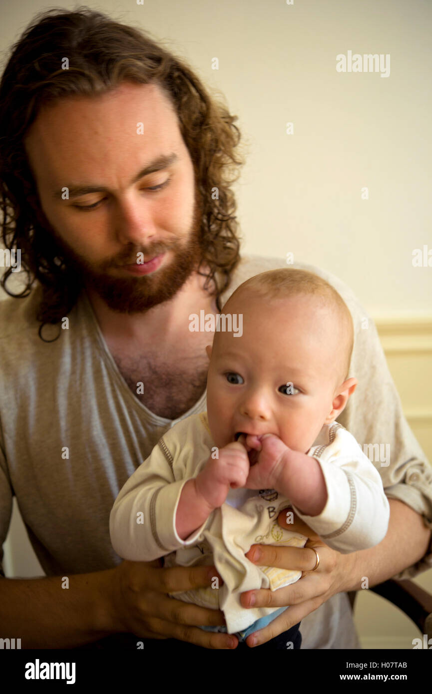 Father caring for infant hi-res stock photography and images - Alamy