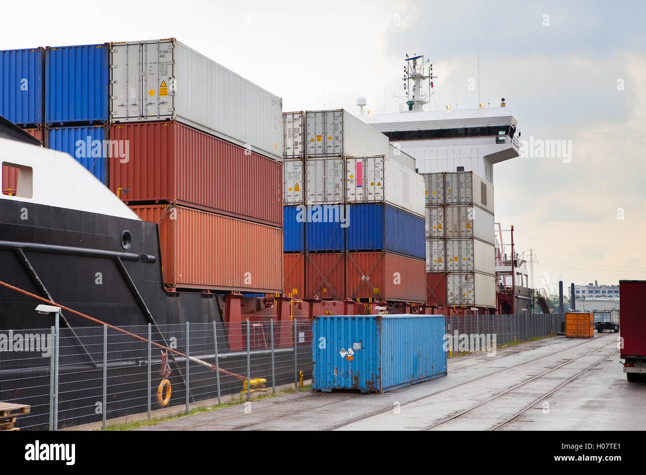 Container ship in port terminal Stock Photo - Alamy