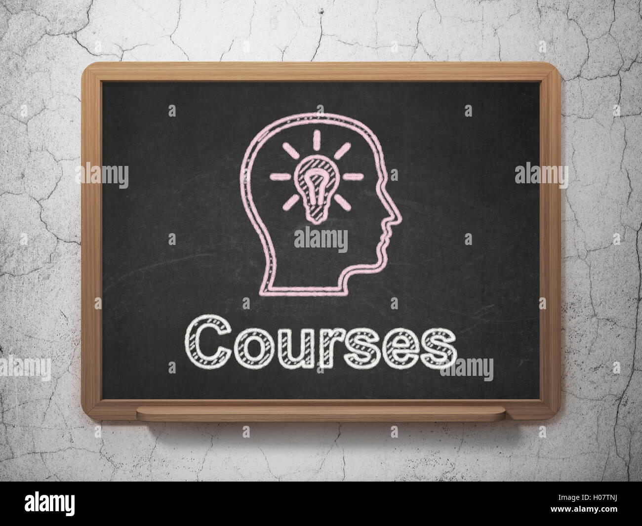 Education concept: Head With Lightbulb and Courses on chalkboard ...