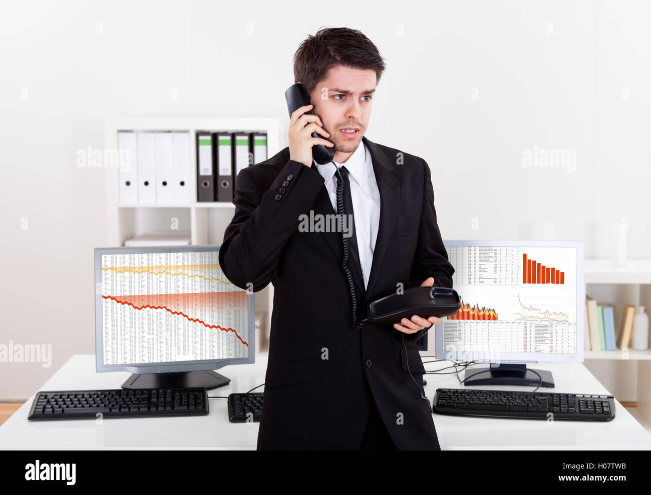 Stock trader computer screen worried hi-res stock photography and ...