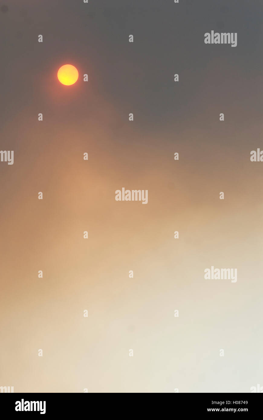 Sun seen through smoke from forest fire in Colorado mountains Stock ...