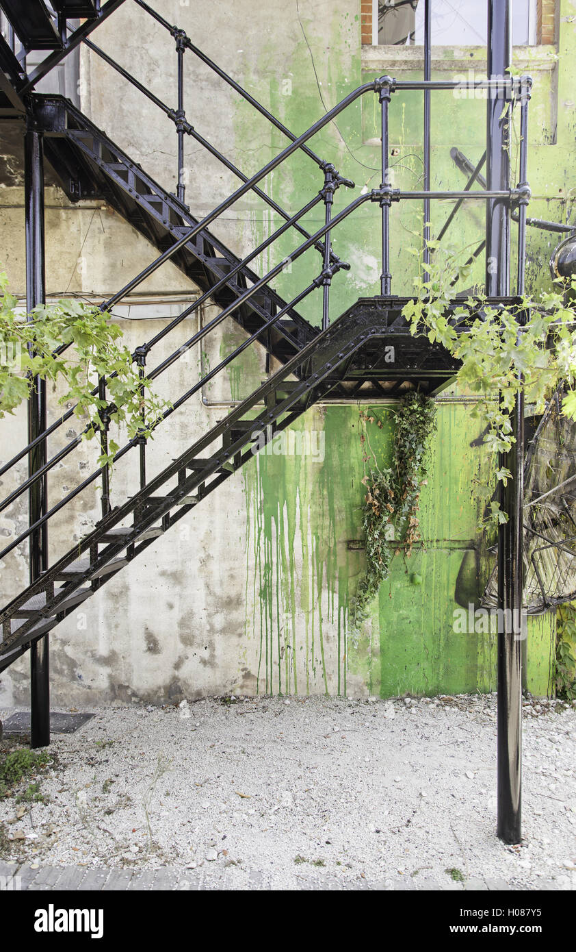 Old metal staircase, detail of a black staircase access Stock Photo - Alamy