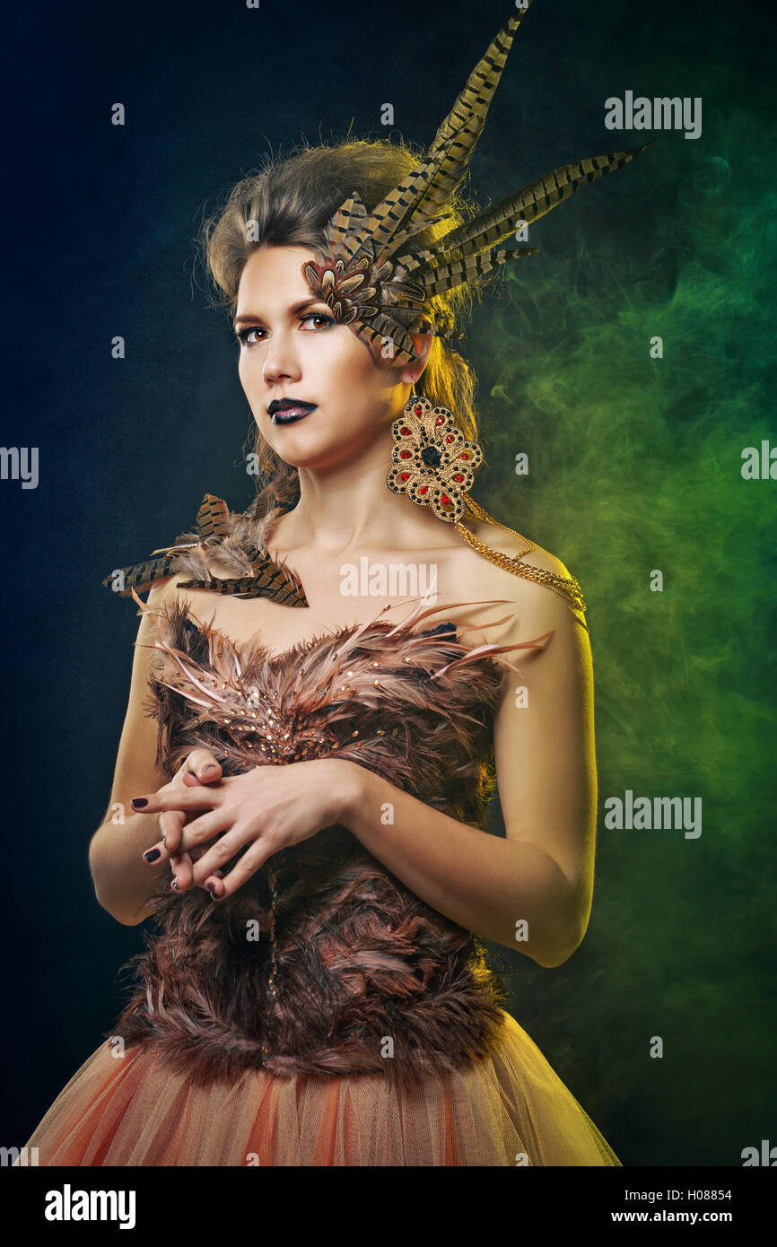 Girl harpy. Creative makeup for Halloween. The concept of magic ...