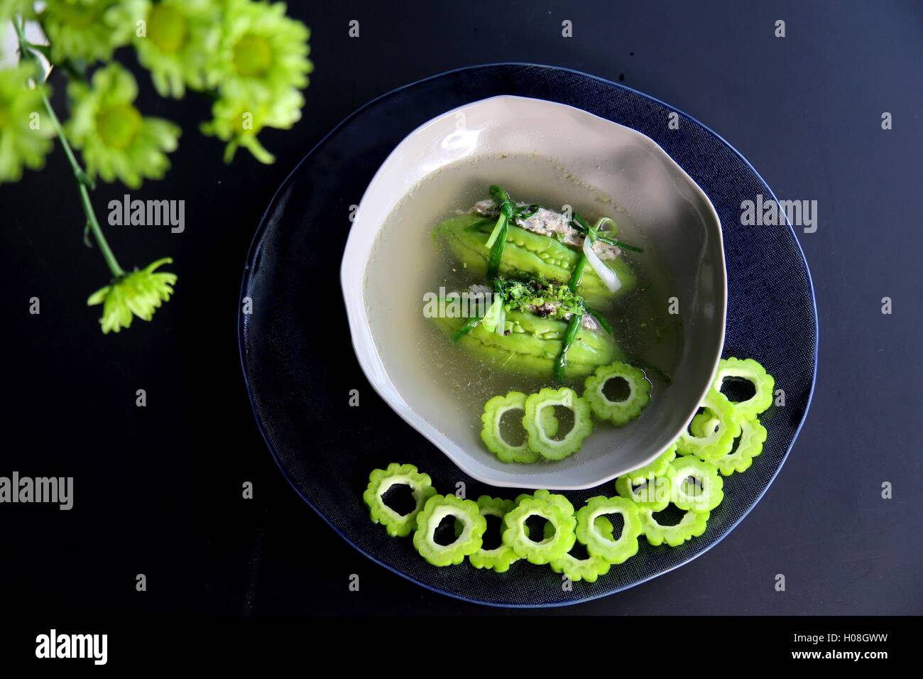 Fish soup with bitter melon Stock Photo - Alamy