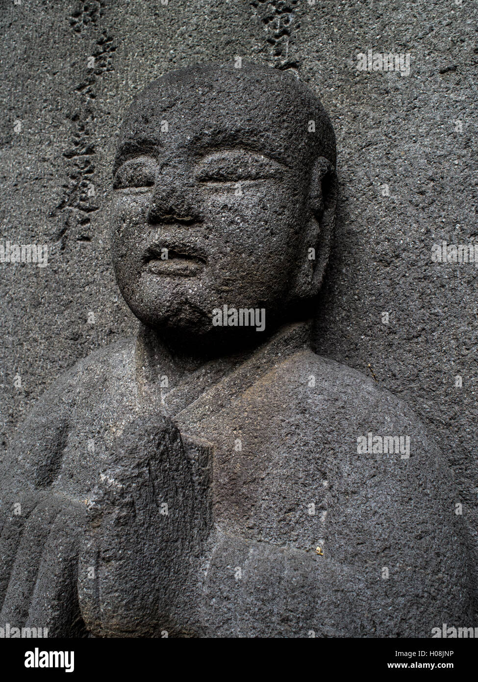 Buddhist statue, praying with yearning sadness, Ikegami, Tokyo, Japan ...