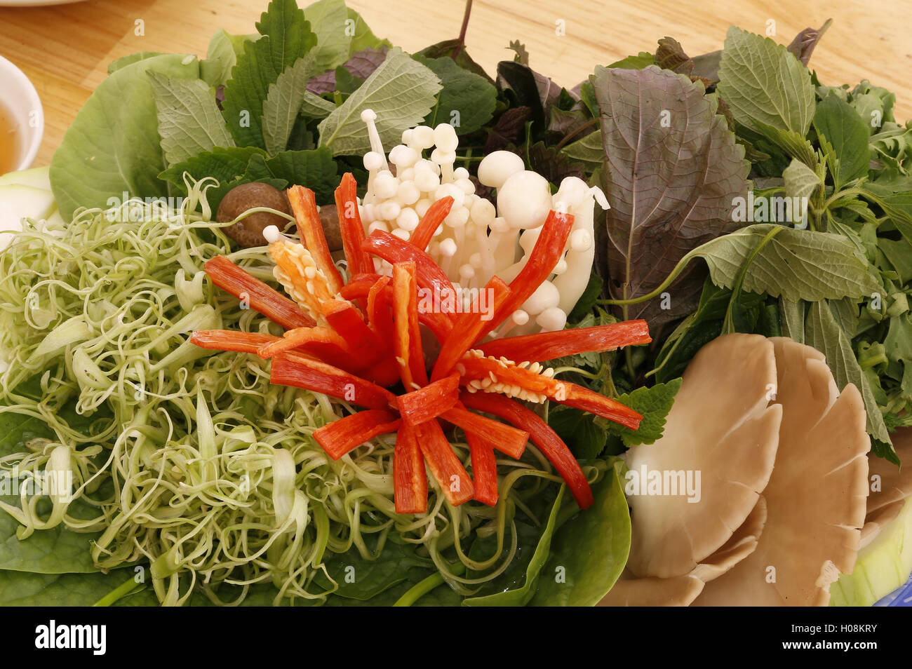 Herbs and vegetables for vietnamese hot pot Stock Photo - Alamy