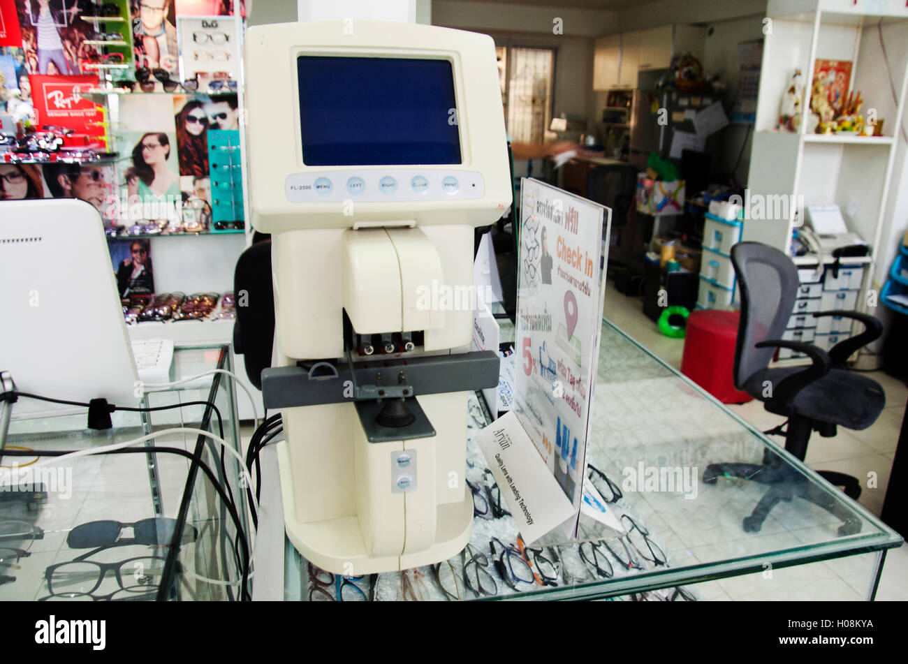 Optical eye test or visual acuity for making glasses by Optician ...