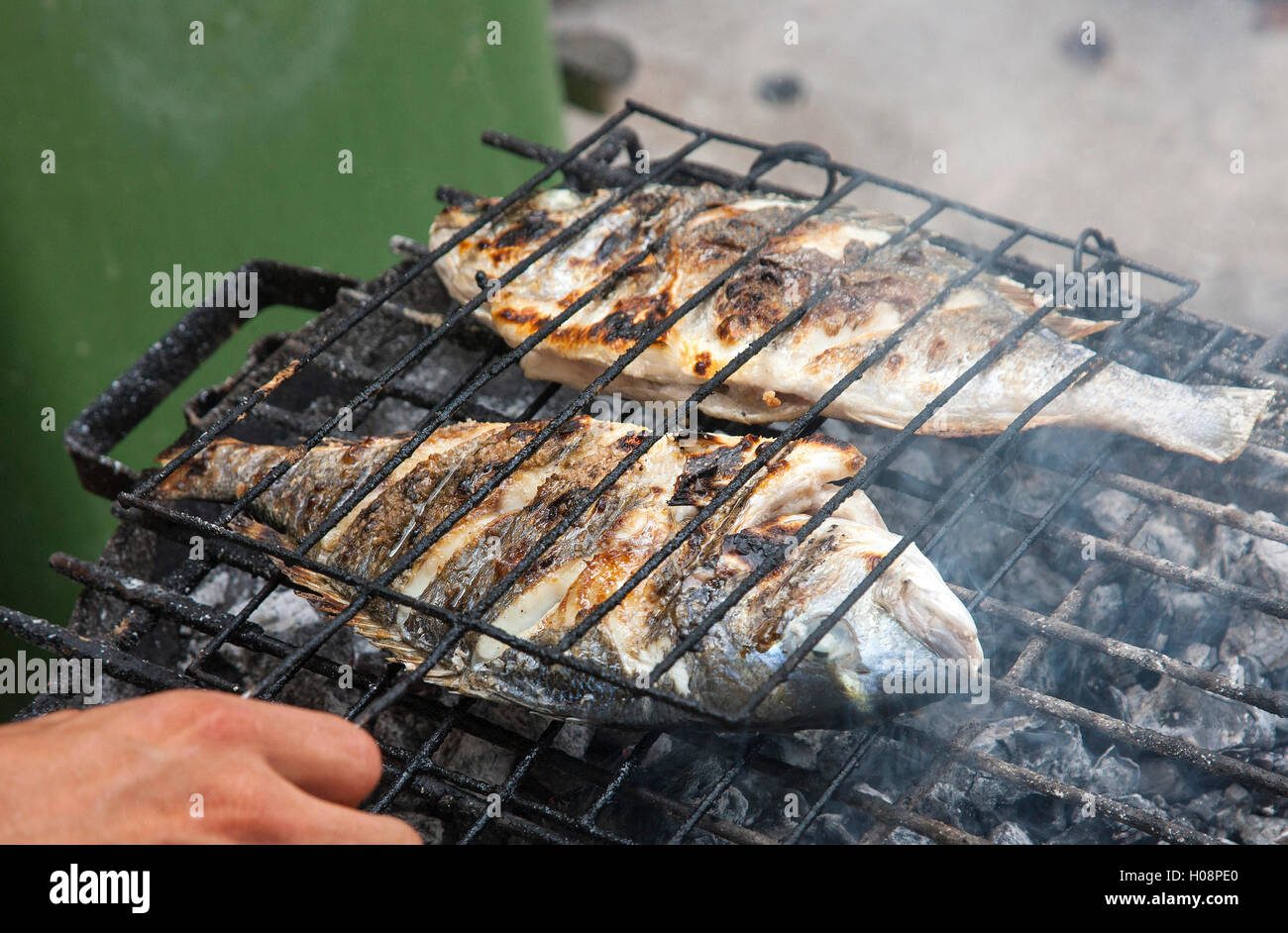 Barbecue Dorado fish Algarve Portugal Stock Photo - Alamy