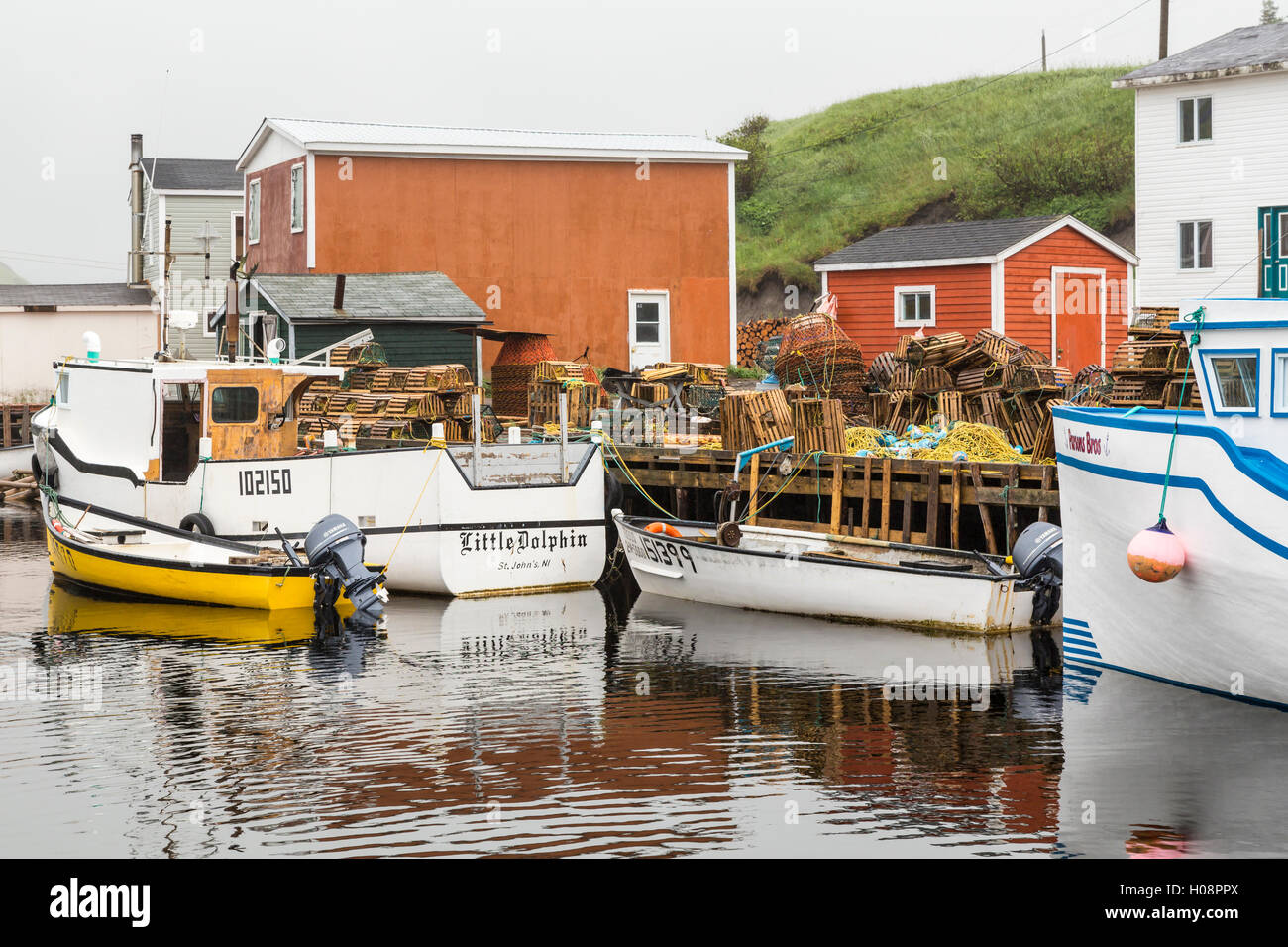 The fishing village and harbour with fishing stages and fishing boats ...
