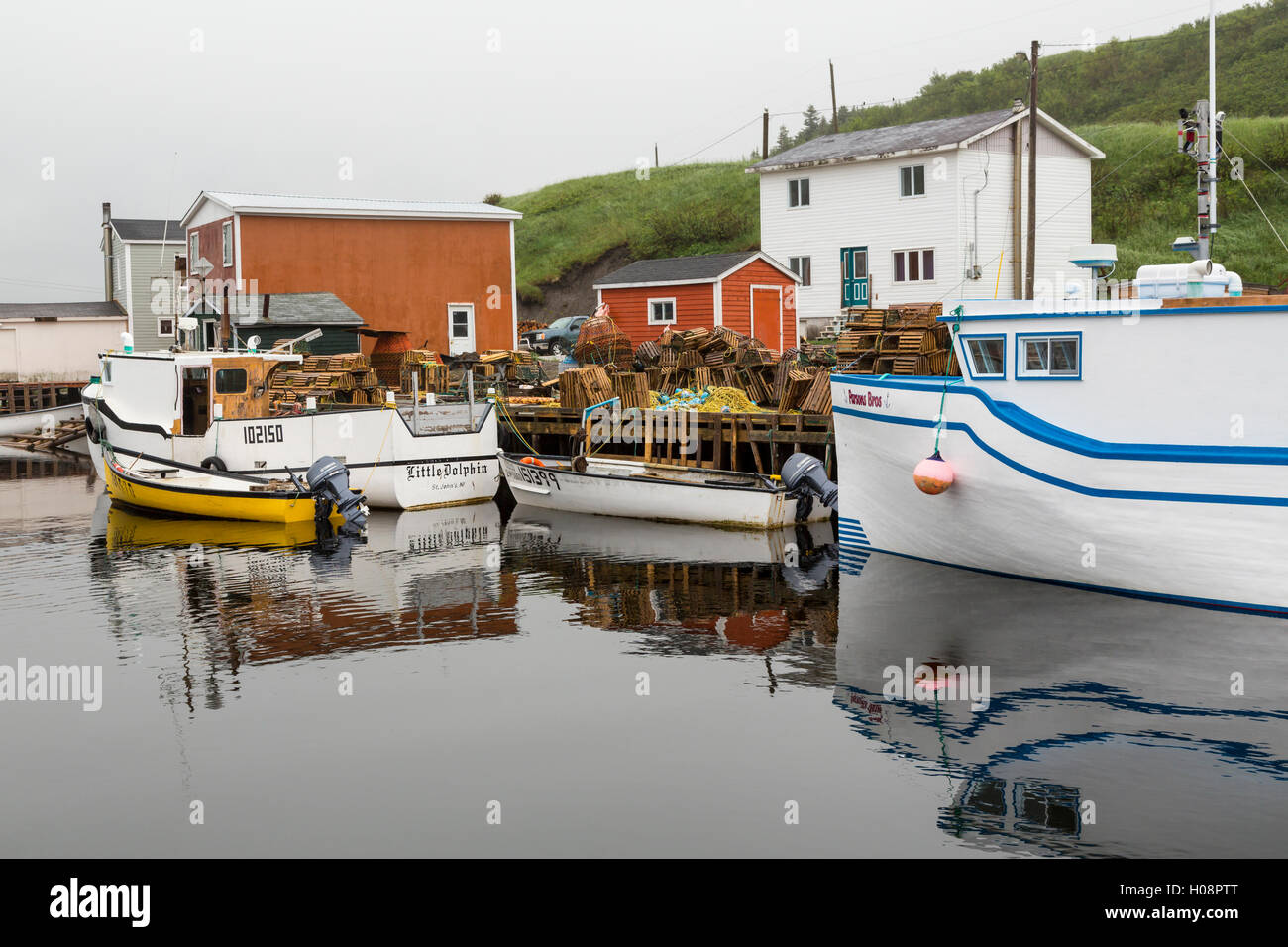 The fishing village and harbour with fishing stages and fishing boats ...