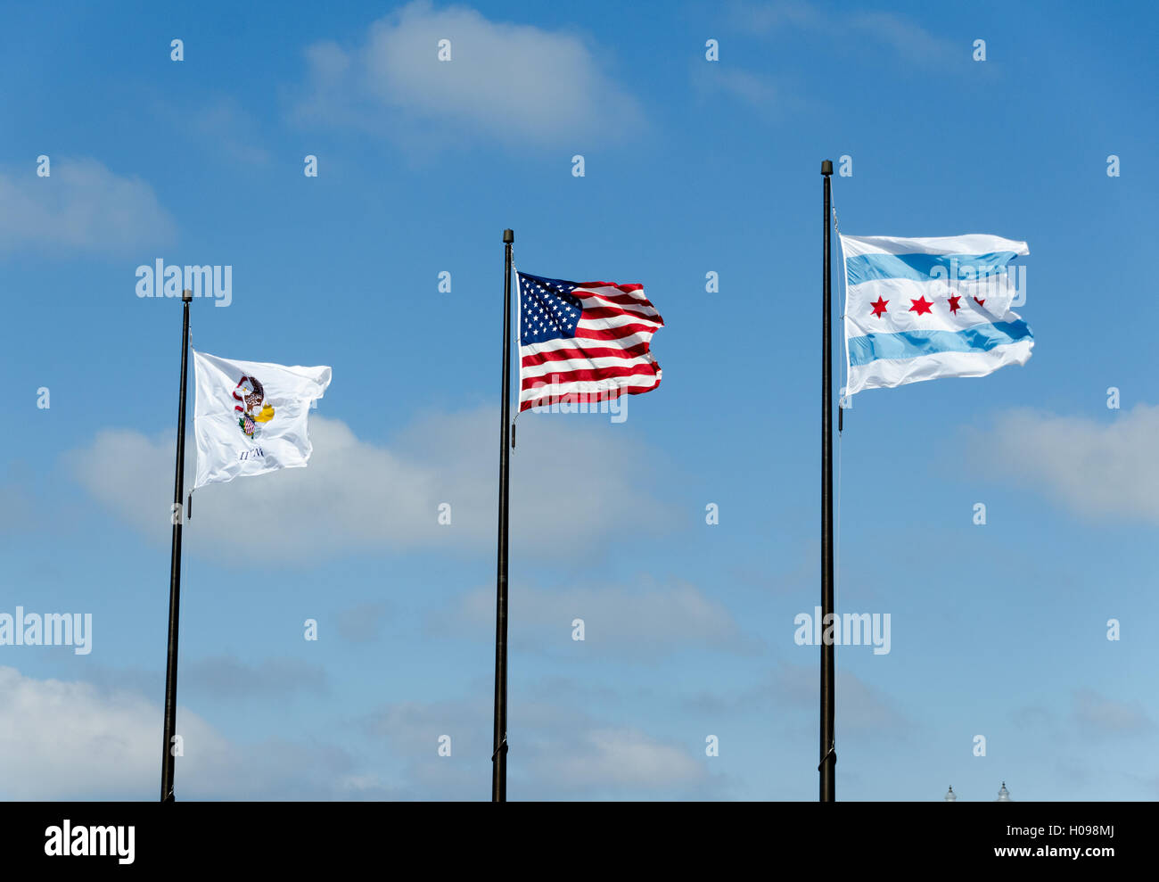 Illinois Flag, US Flag, and Chicago flag waving in strong breeze Stock ...
