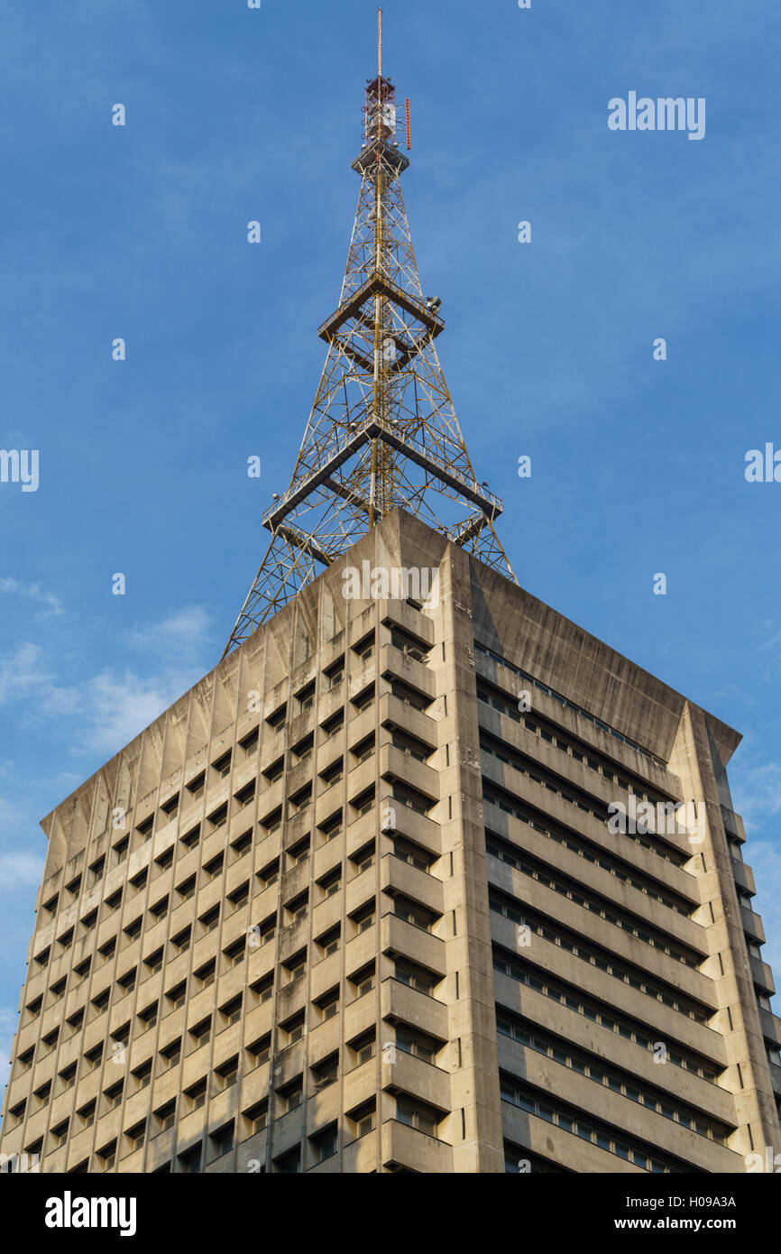 Old building with communication tower Stock Photo - Alamy