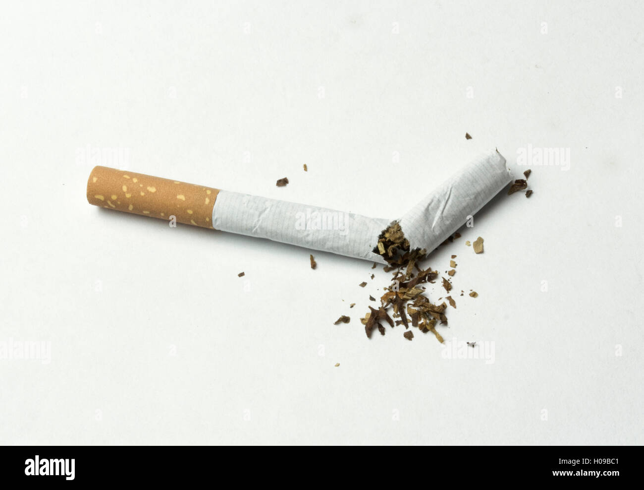 Broken cigarette with splash made out of tobacco. Creative, original ...