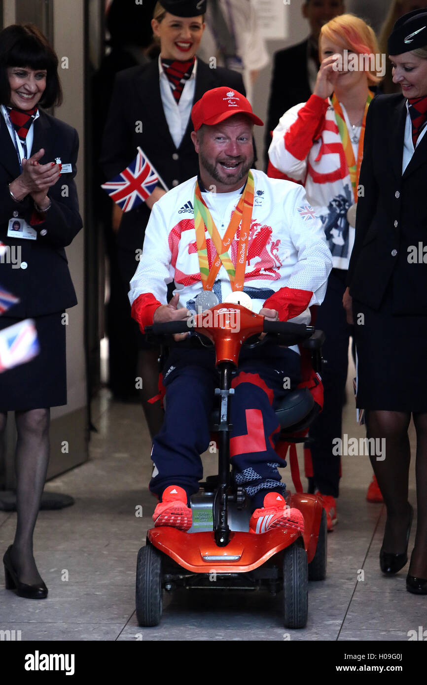 Great Britain's Lee Pearson arrives back at Heathrow Airport, London ...