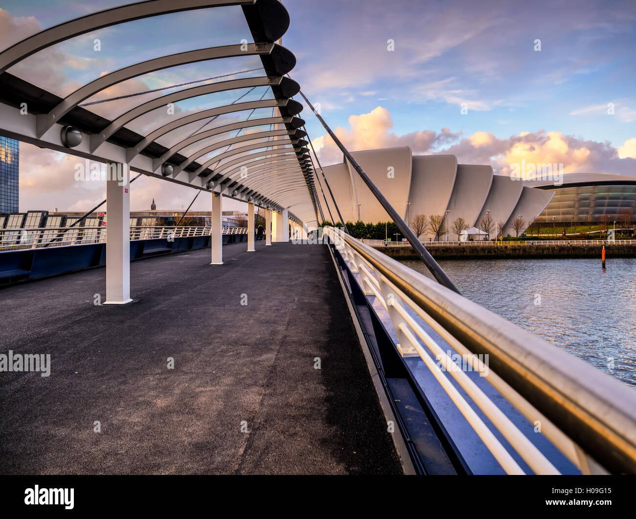 A stunning sunset over Bells Bridge, Glasgow, Scotland, United Kingdom ...