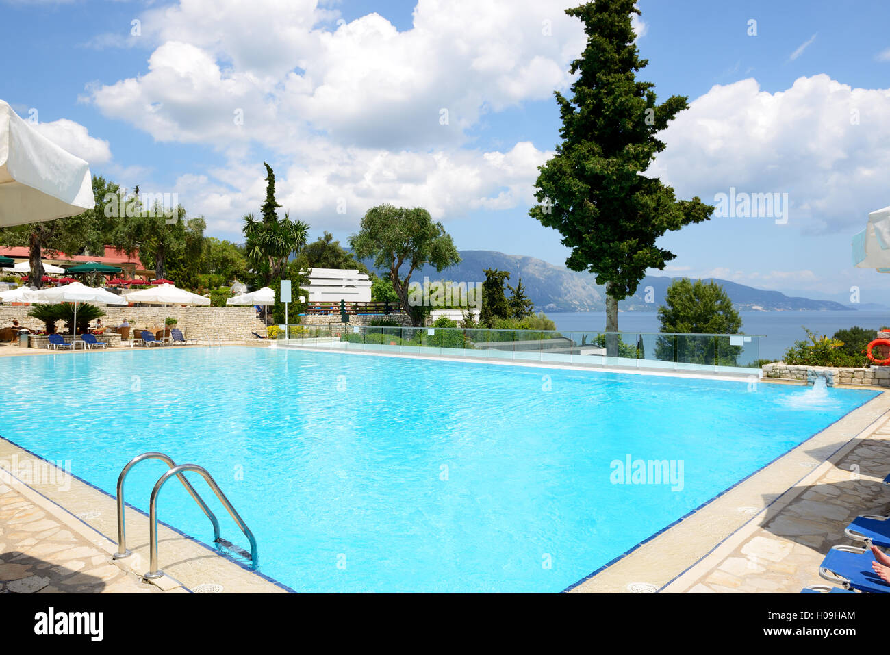 Swimming pool at luxury hotel, Corfu island, Greece Stock Photo - Alamy