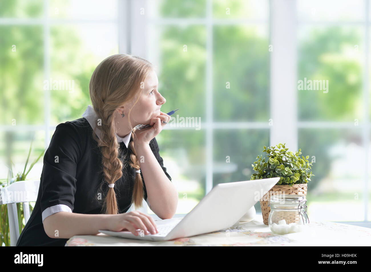happy girl using laptop Stock Photo - Alamy