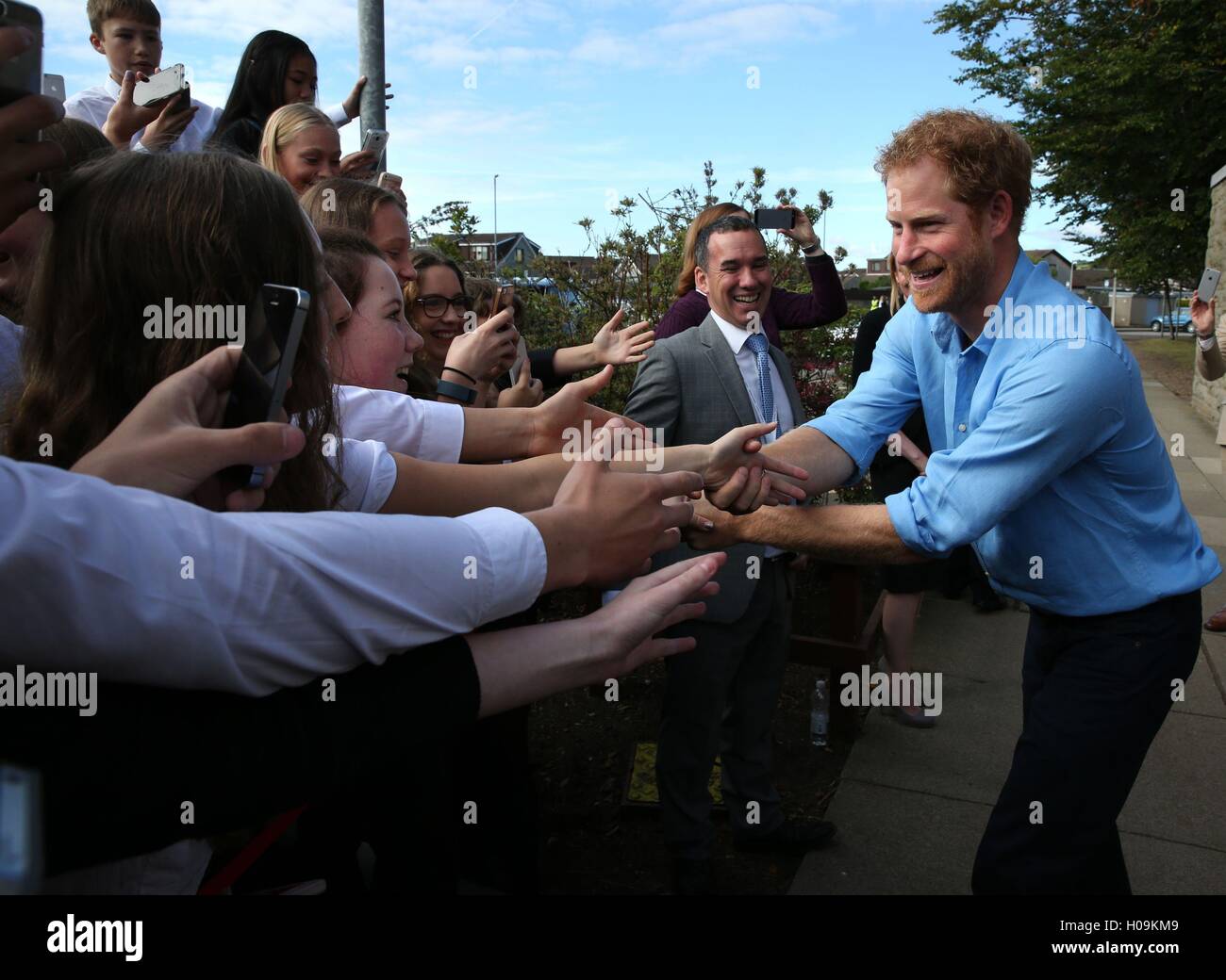 Prince Harry shakes hands with pupils from Mackie Academy in Stonehaven ...