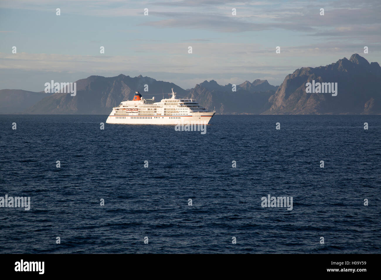 Cruise ship passing mountains of lofoten islands hi-res stock ...