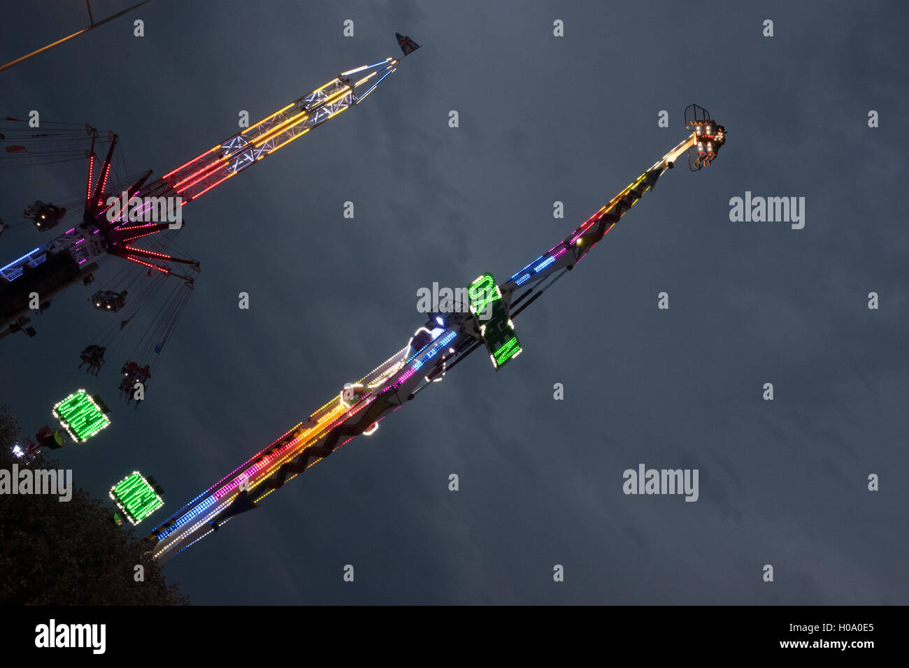 Fairground rides weymouth at night Stock Photo - Alamy