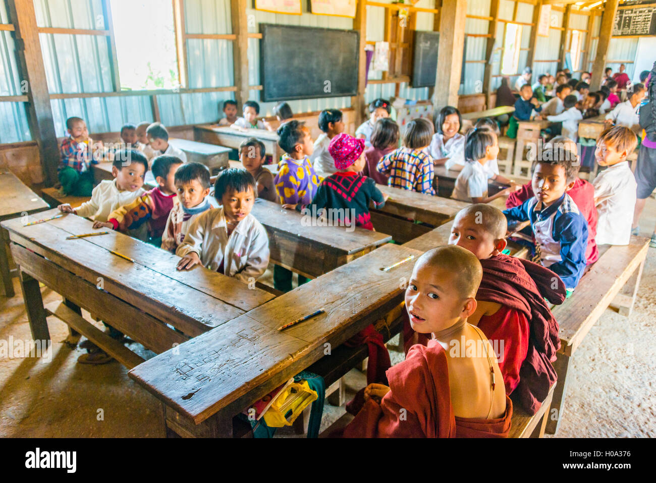 School children sitting at their desks, classroom, Shan State, Myanmar ...