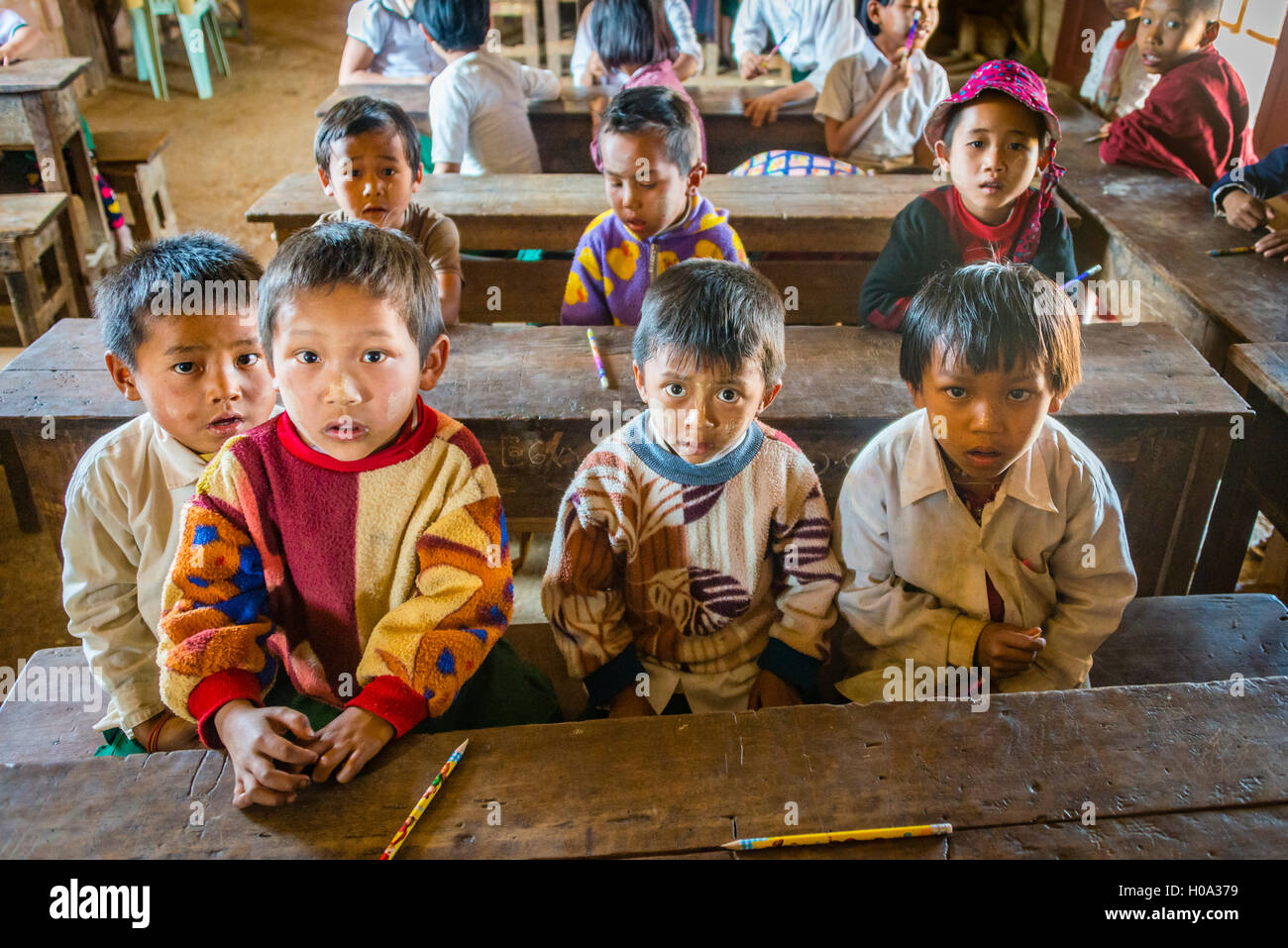 School children sitting at their desks, classroom, Shan State, Myanmar ...