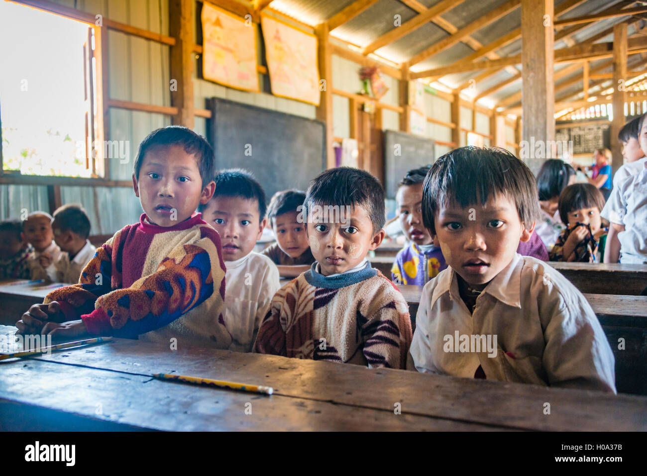 School children sitting at their desks, classroom, Shan State, Myanmar ...