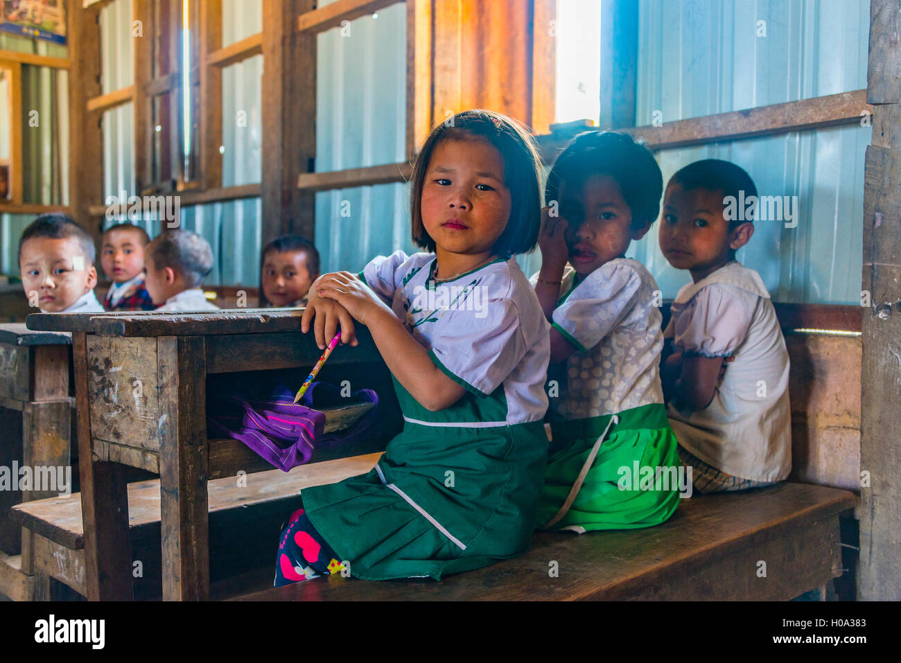 School children sitting at their desks, classroom, Shan State, Myanmar ...