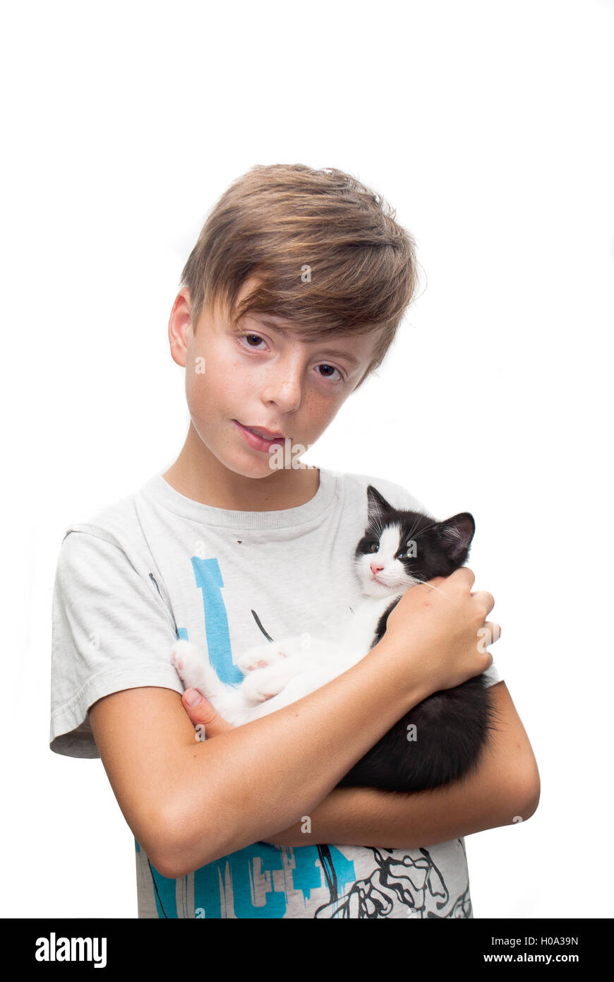 Child holding cat hi-res stock photography and images - Alamy