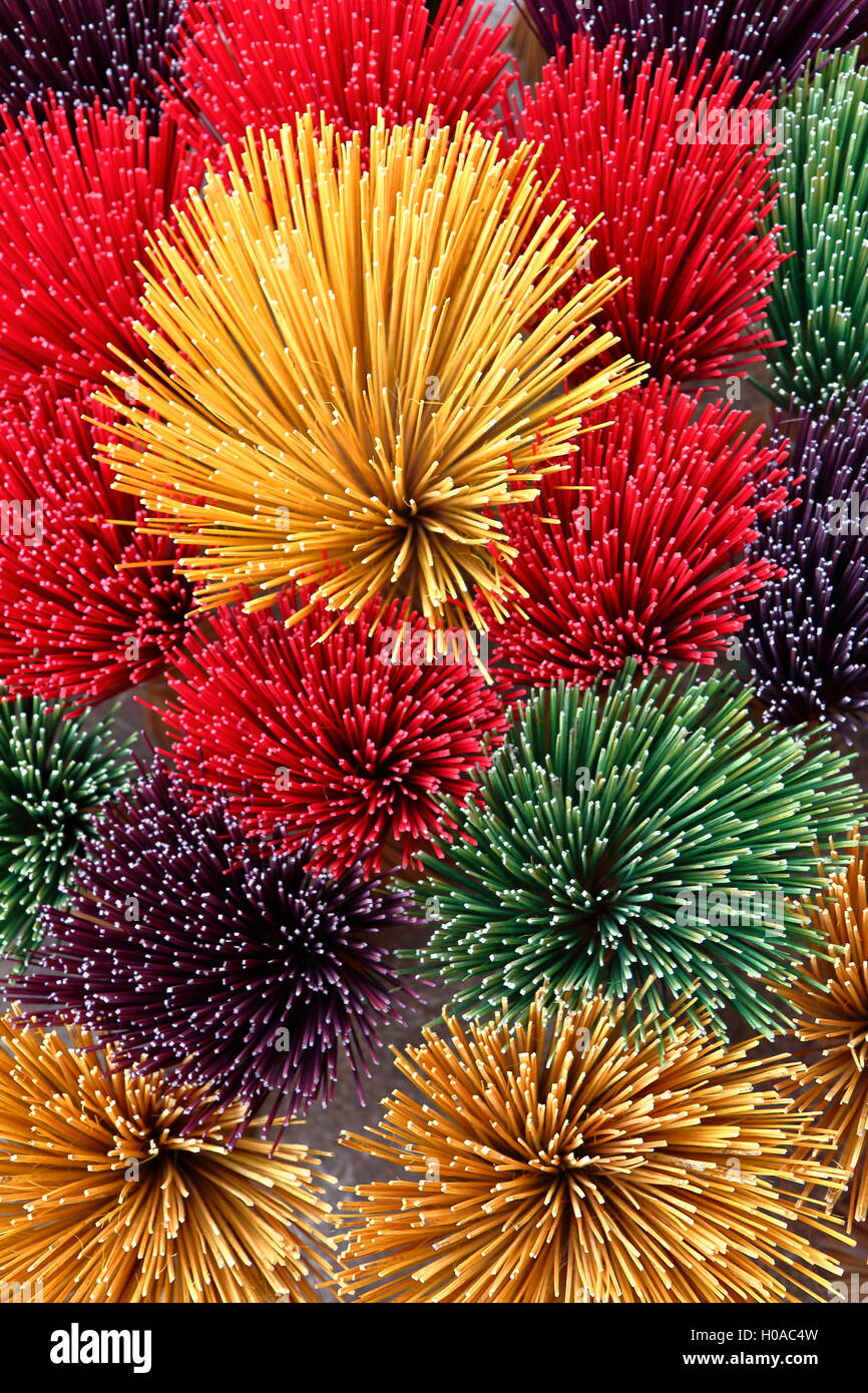 Colored incense sticks Stock Photo - Alamy