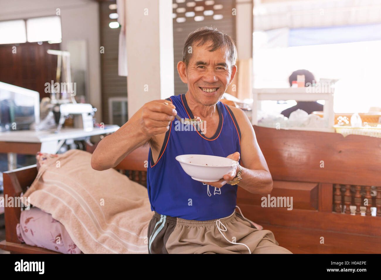 Man eating rice hi-res stock photography and images - Alamy