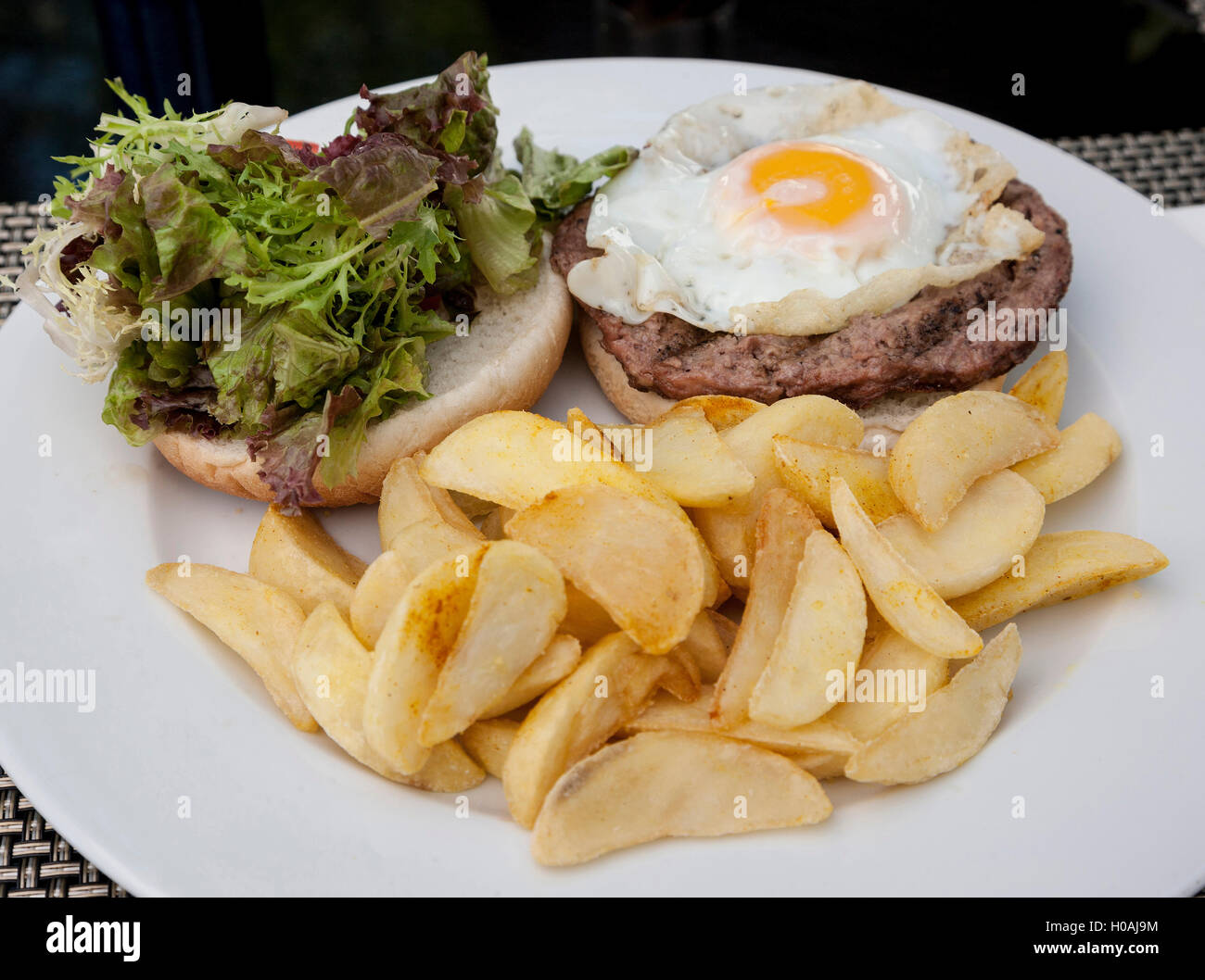 Beefburger chips and egg Stock Photo - Alamy