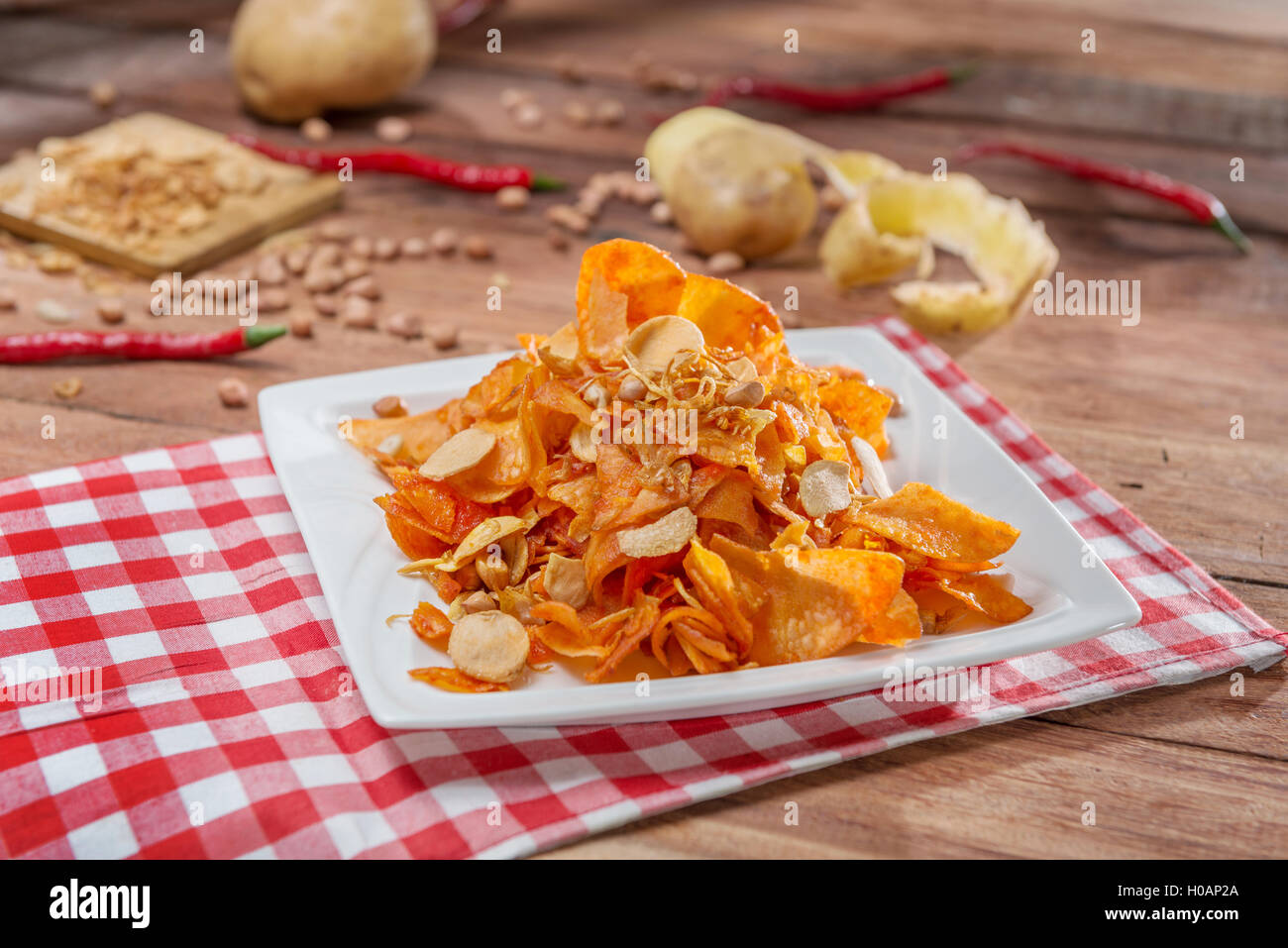 Plate of fried potato on the table in restaurant Stock Photo - Alamy