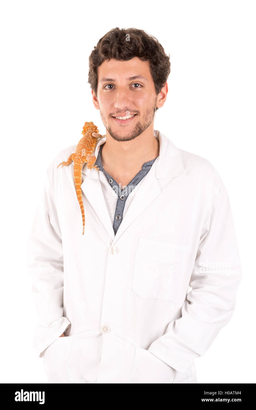 Young veterinarian with lizard isolated in white Stock Photo - Alamy