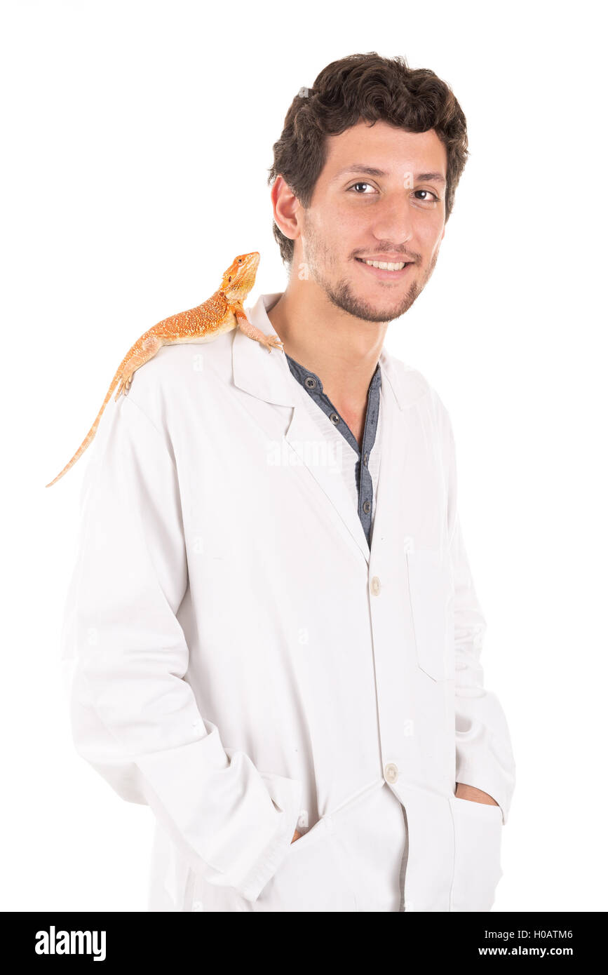 Young veterinarian with lizard isolated in white Stock Photo - Alamy