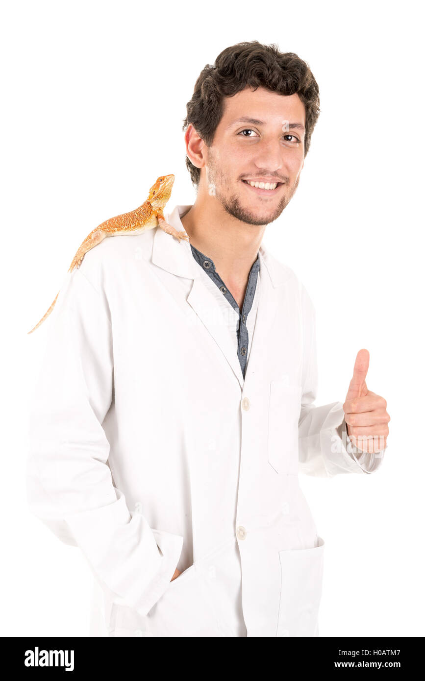 Young veterinarian with lizard isolated in white Stock Photo - Alamy
