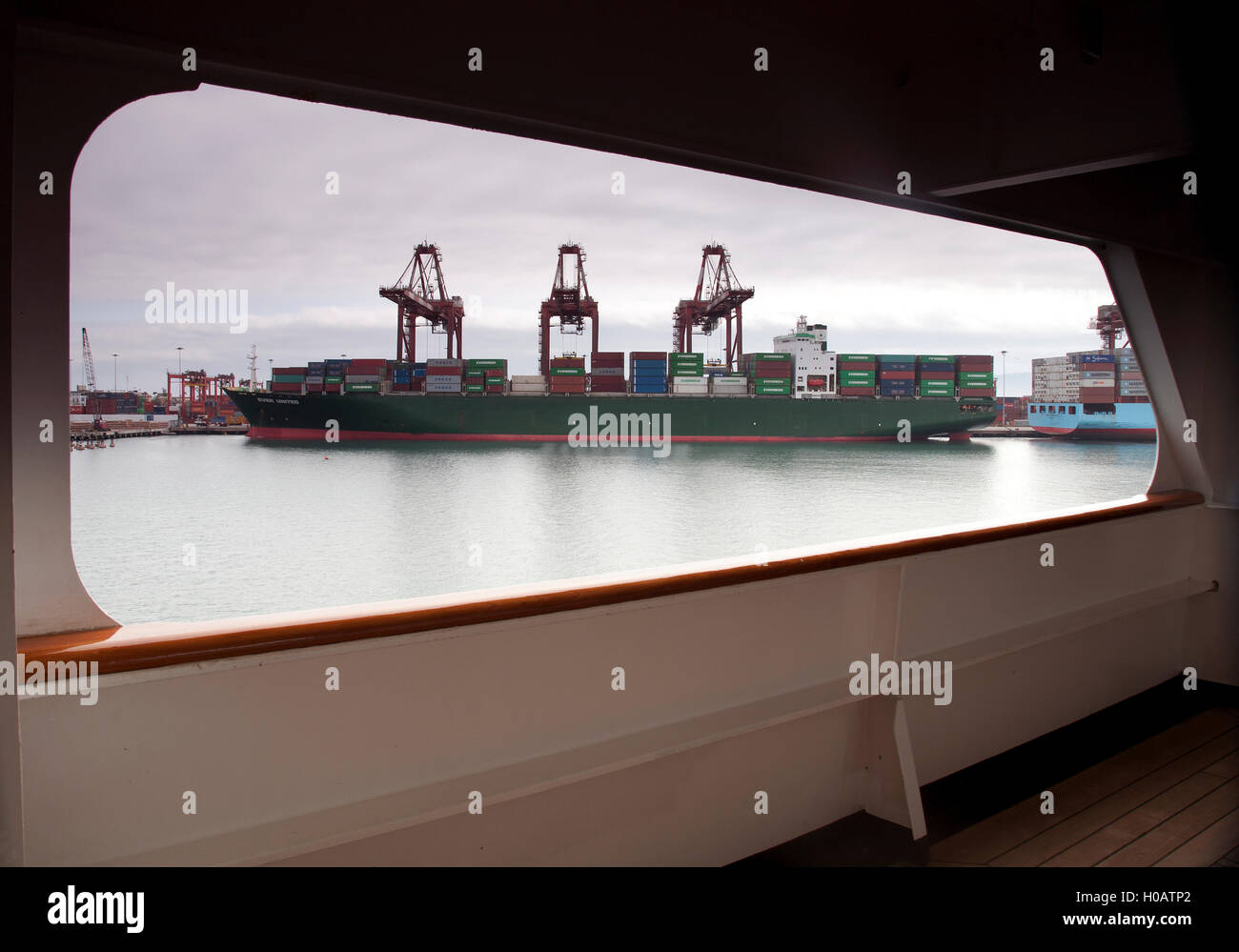 A Container Ship being loaded with Shipping Containers, seen through ...