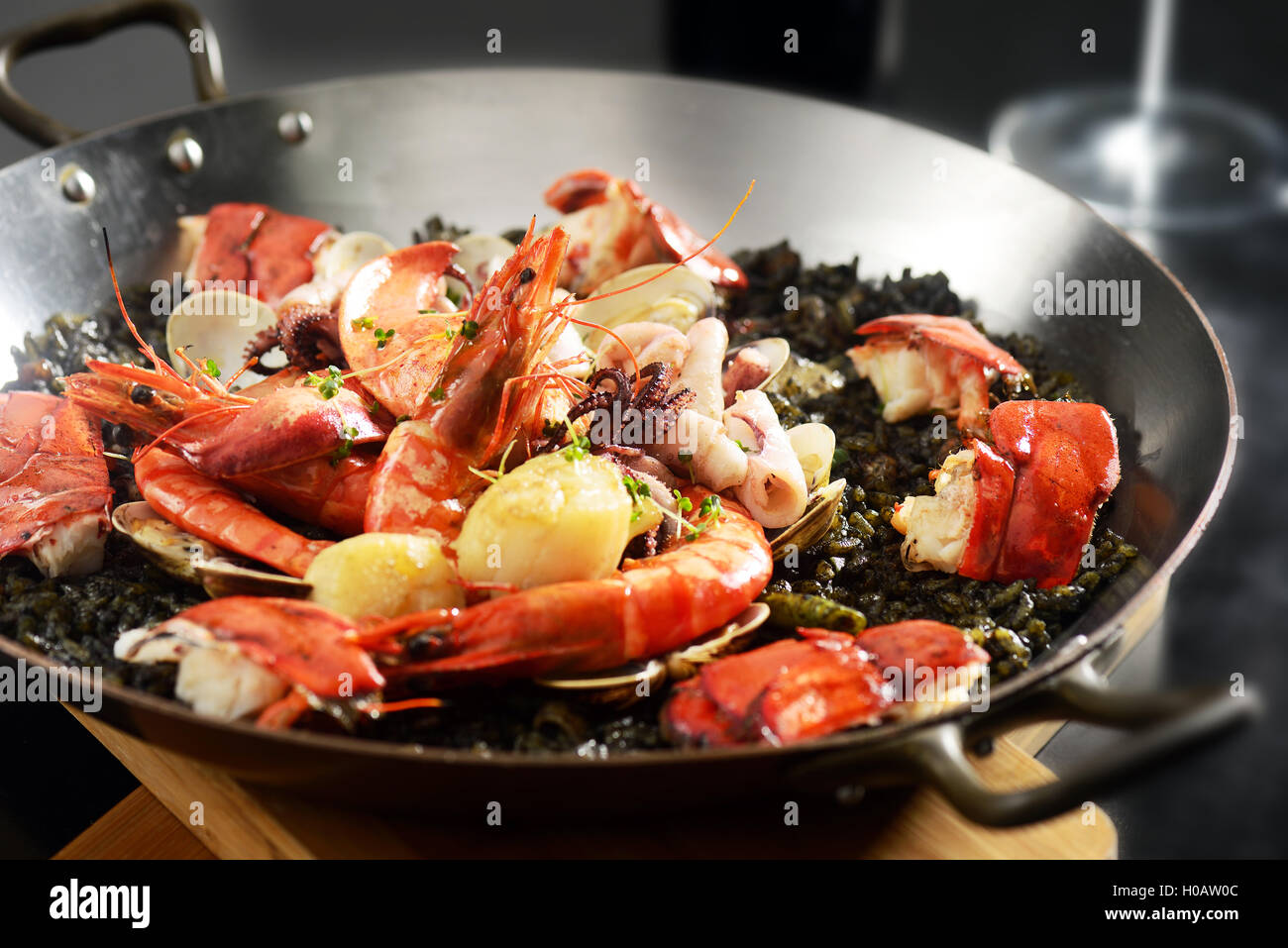 Pan of fried seafood with shrimp octopus squids calms shells and ...