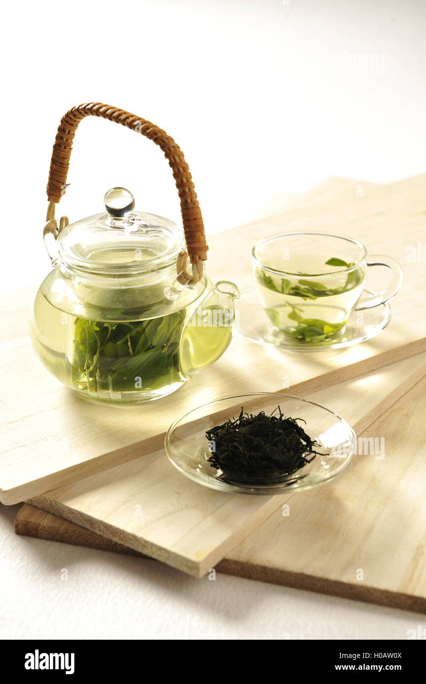 Set of green tea cup on wooden table in white background Stock Photo ...