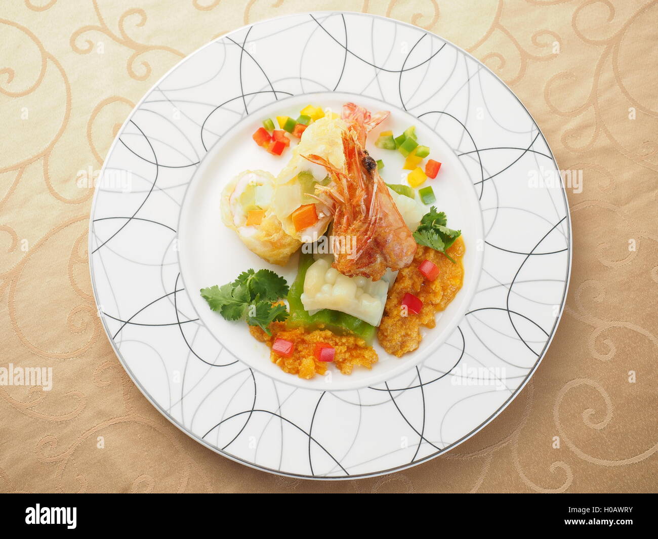 Fried shrimp head on white plate in asian restaurant Stock Photo - Alamy