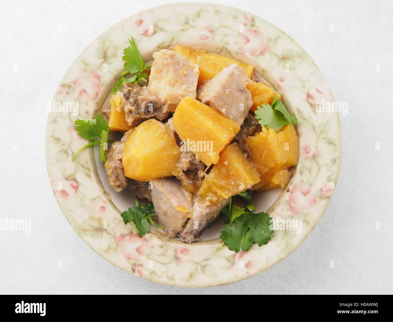Braised sweet potato on plate in asian restaurant Stock Photo - Alamy