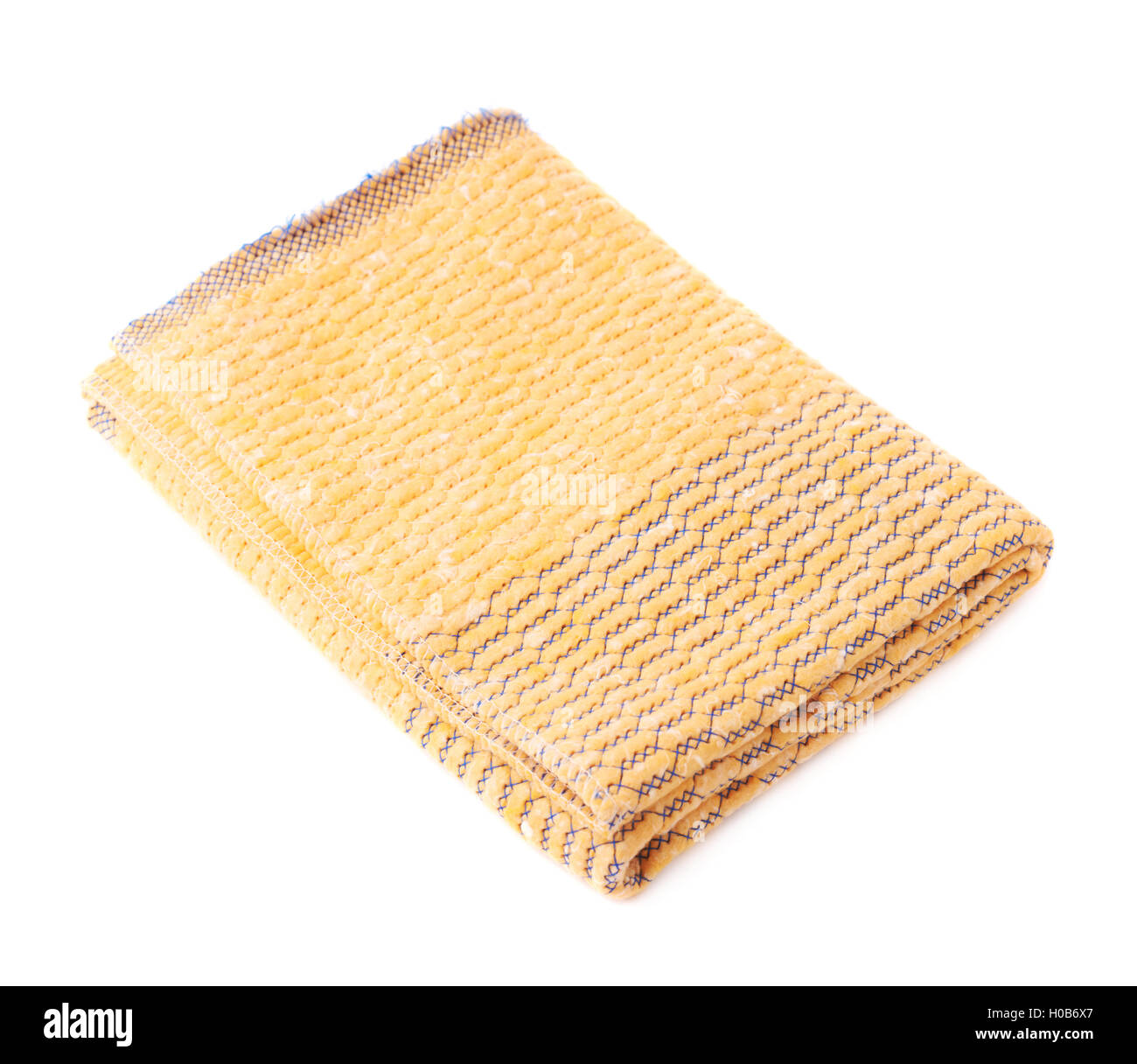 Folded yellow towel isolated over the white background Stock Photo - Alamy