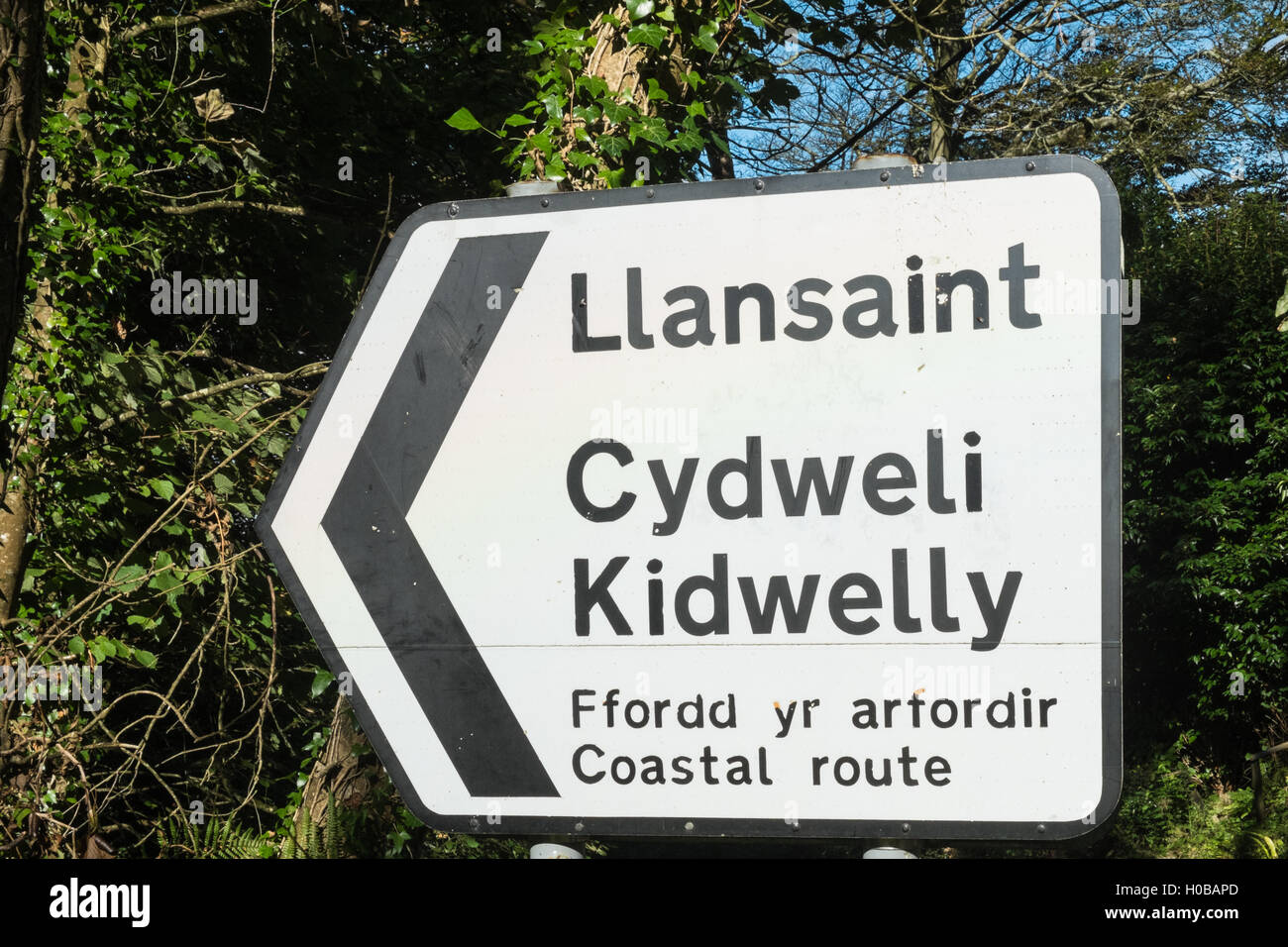 Bilingual road sign to Kidwelly,and Llansaint via coastal road in ...