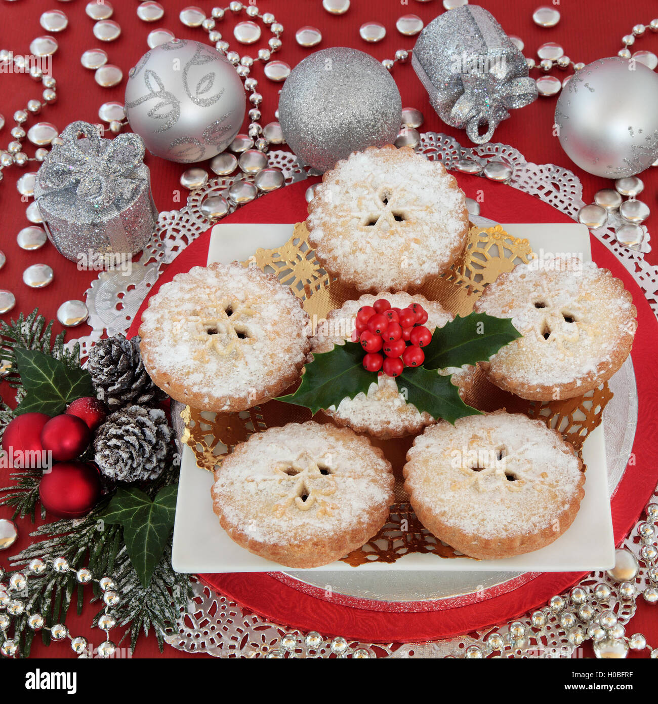 Traditional christmas mince pie cakes with silver bauble decorations ...