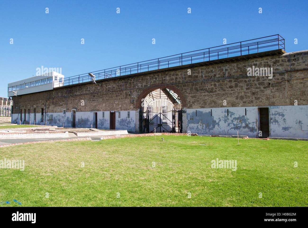 Boundary, watchtower, railing and arched gateway to the outdoor ...