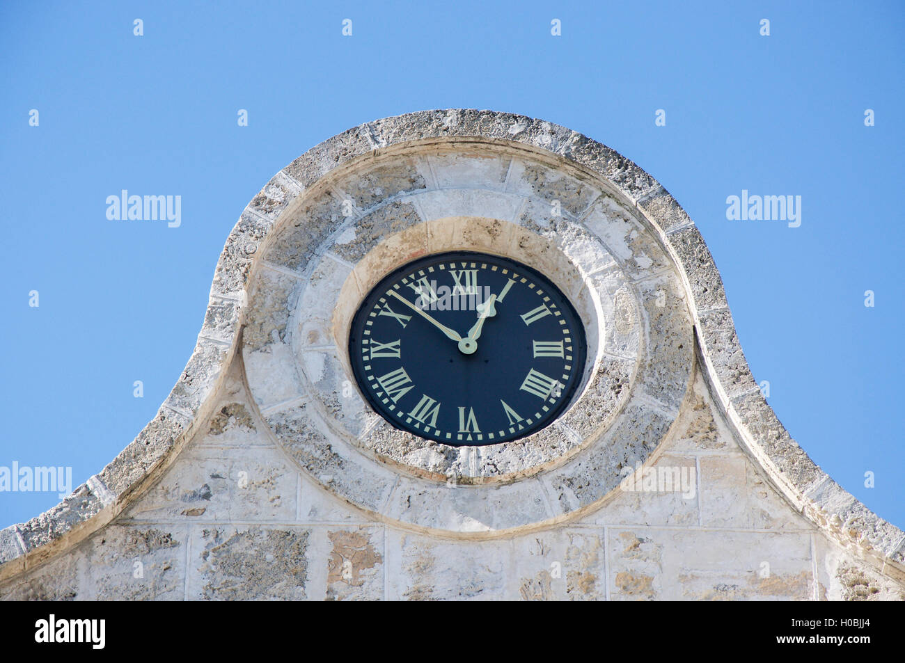 Clock detail in the limestone brick architecture of the Fremantle ...